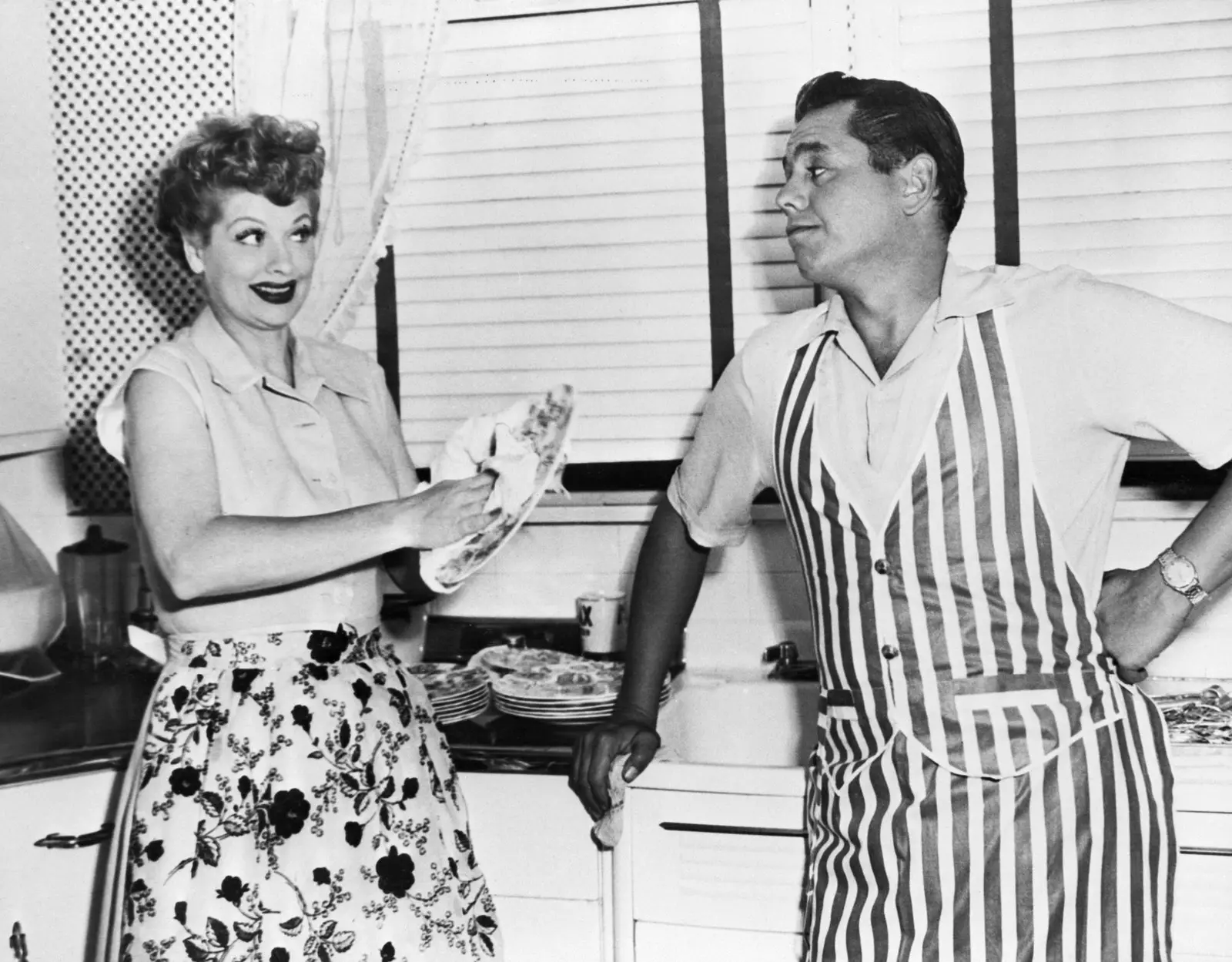 Ball and Arnaz in their own kitchen.