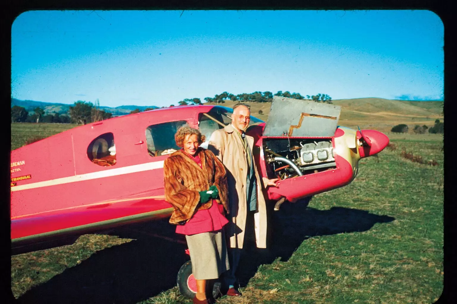 Maye Joshua and Wyn's parents with their Winnie plane in 1955.