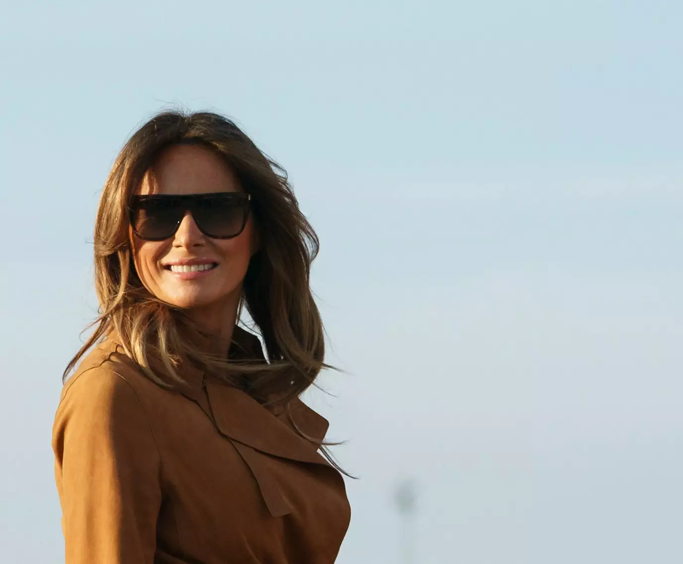 Melania Trump amb abric camel