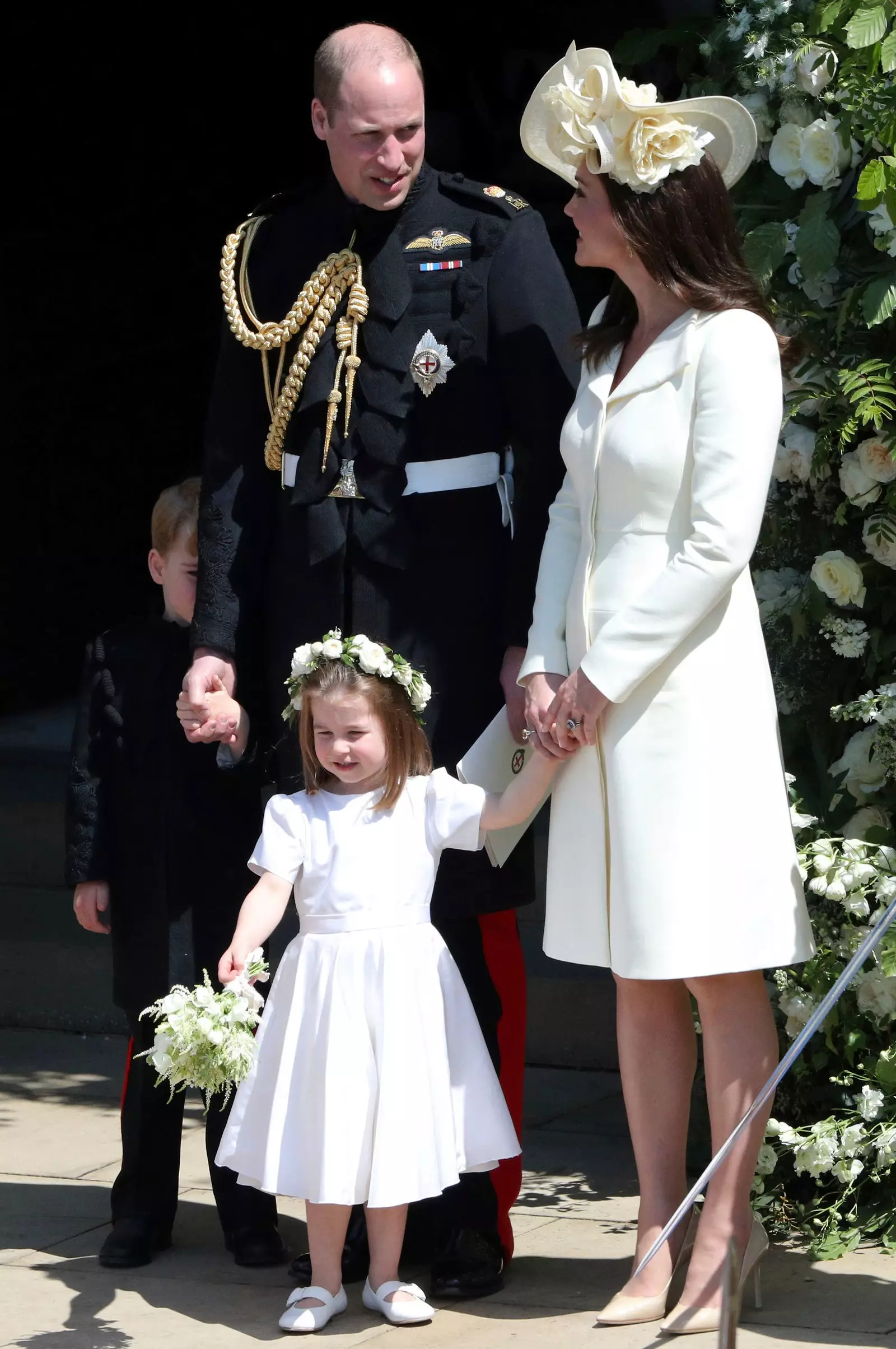 Prince William ak Kate Middleton ak Princess Charlotte nan maryaj Prince Harry ak Meghan Markle nan mwa me 2018.