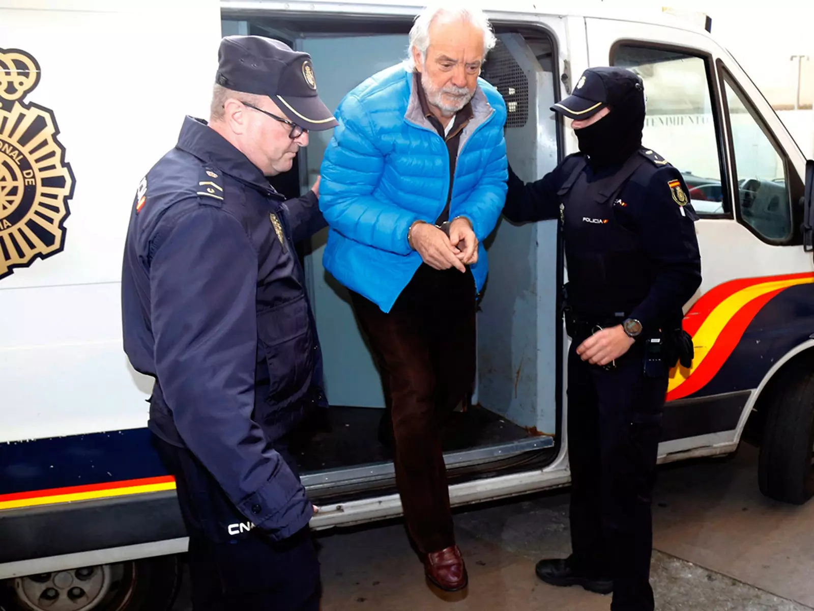 Bartolom Cursach getting off the police van that took him to court.