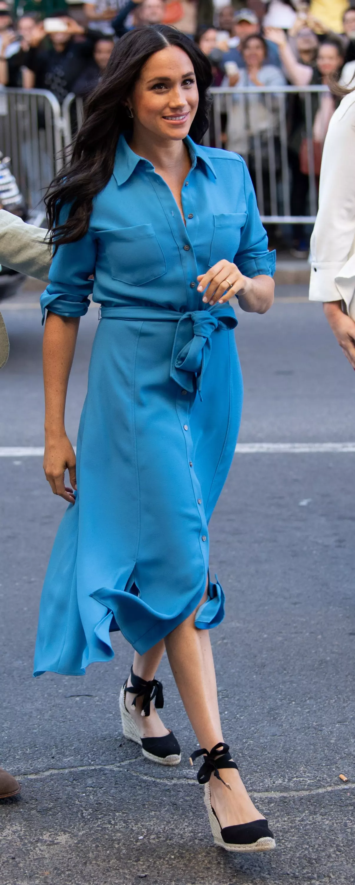 Meghan Markle in a cerulean blue shirt dress that she had already resorted to.