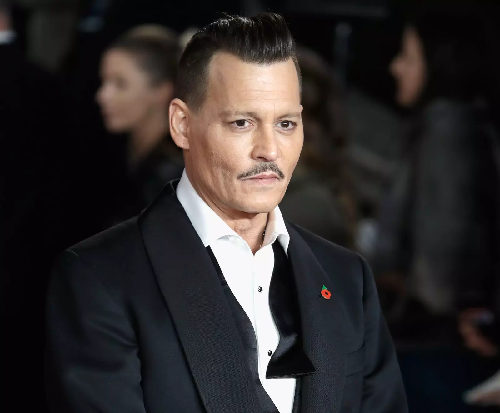 Kinokolekta ni Johnny Depp ang kanyang buong cache sa kabila ng pagtanggal sa 'Fantastic Beasts 3'