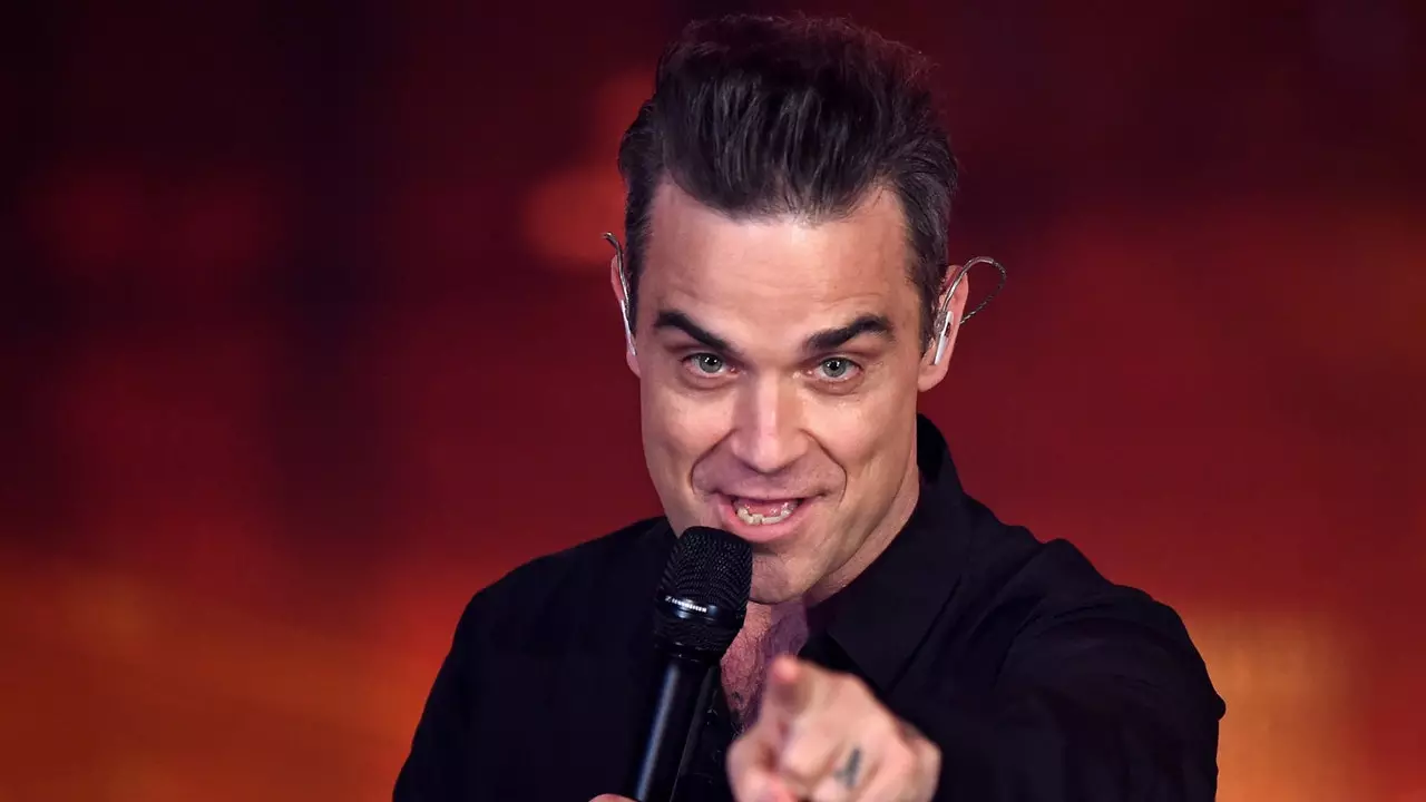 Robbie Williams offentliggør sin datters overraskende reaktion, da han så det mest kontroversielle videoklip fra hans karriere