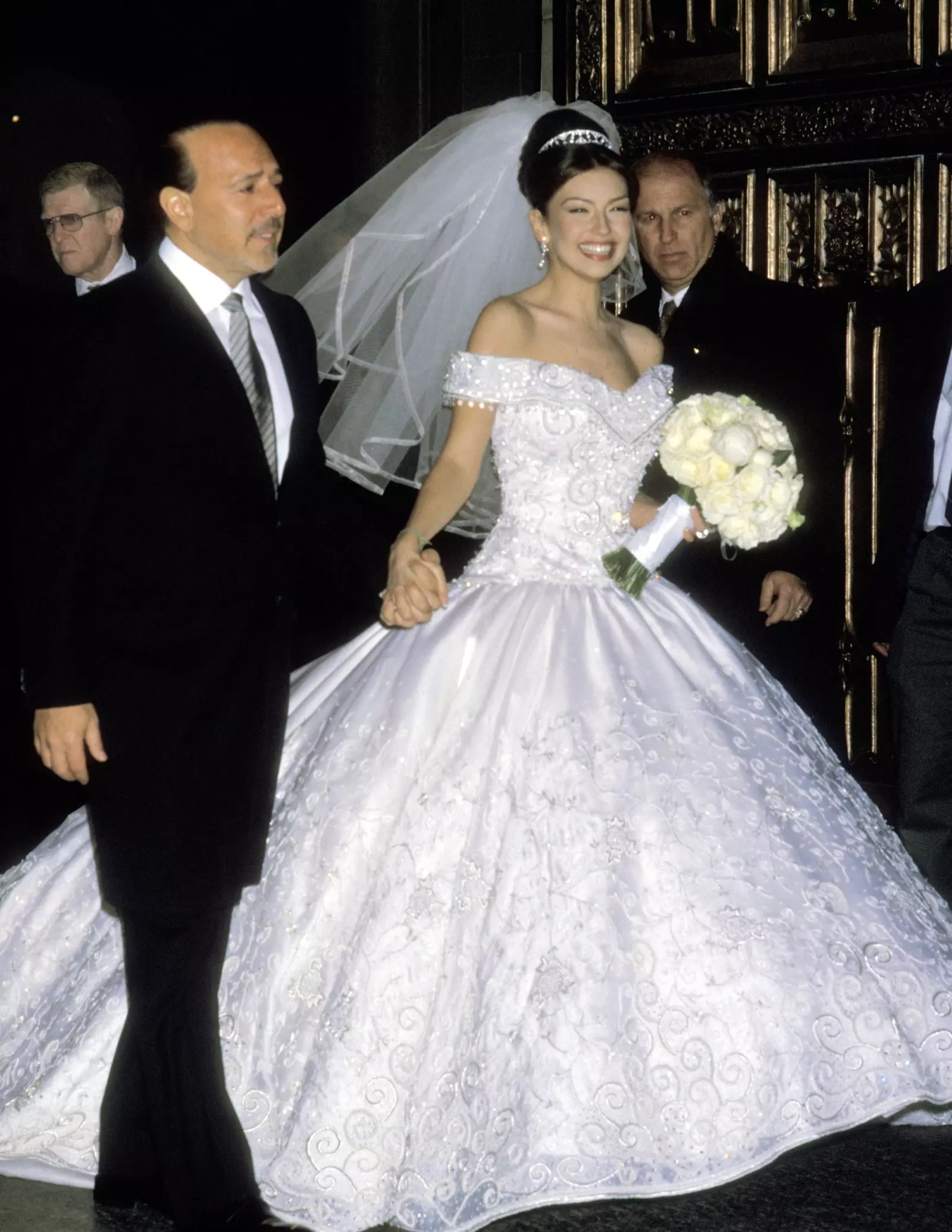 Tommy Mottola and Thalía leaving St. Patrick's Cathedral on their wedding day.